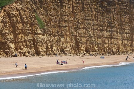 People on beach by West Bay Cliffs, Jurassic Coast World Heritage Site ...