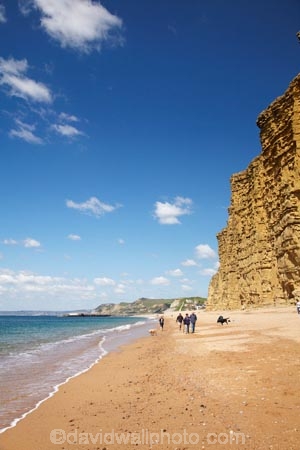 People on beach by West Bay Cliffs, Jurassic Coast World Heritage Site ...