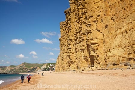 People on beach by West Bay Cliffs, Jurassic Coast World Heritage Site ...